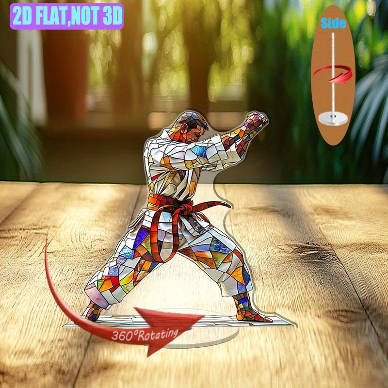 Rotating acrylic display featuring a karate athlete delivering a ...