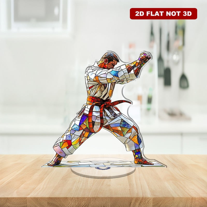Rotating acrylic display featuring a karate athlete delivering a ...