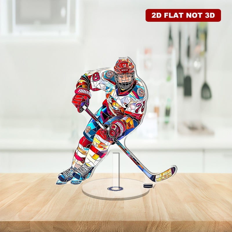 Rotating acrylic display featuring a player making a quick deke with ...