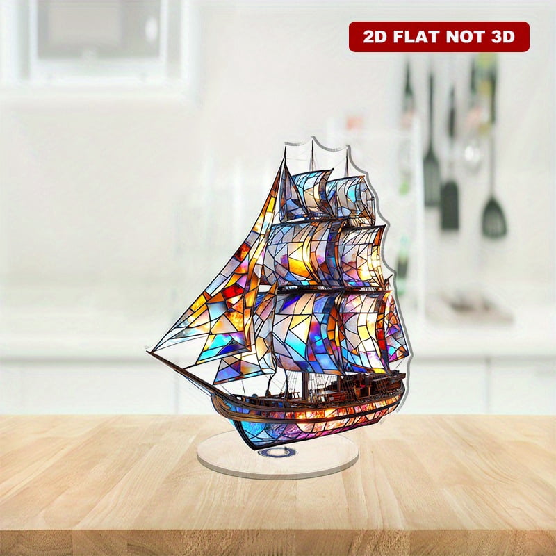 Rotating acrylic display featuring a ship design with stained glass ...