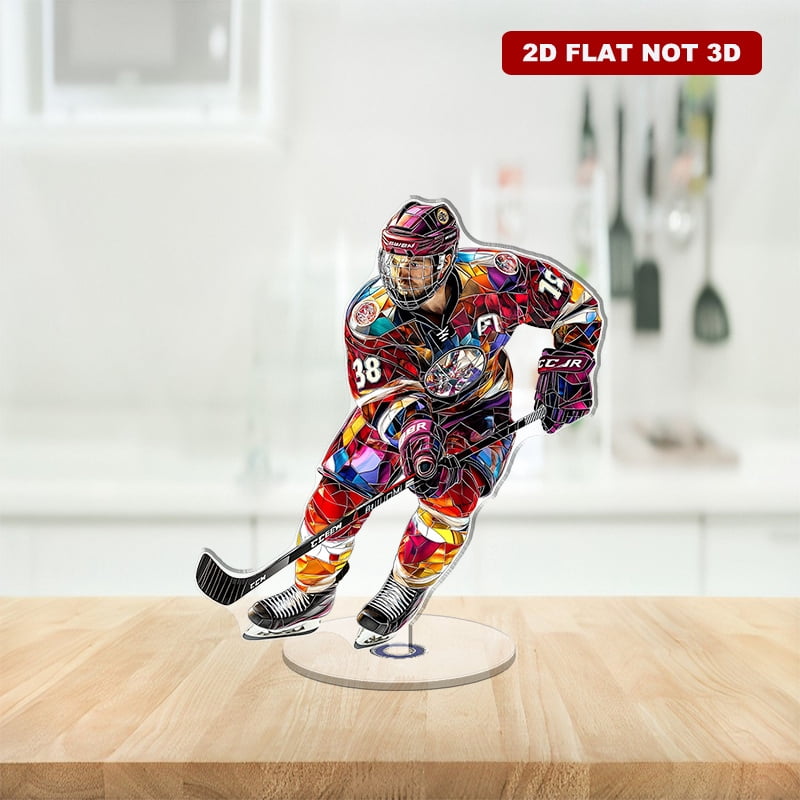 Rotating acrylic display featuring a stained glass hockey player ...
