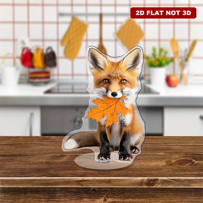 Rotating acrylic display featuring a young red fox holding a vibrant ...