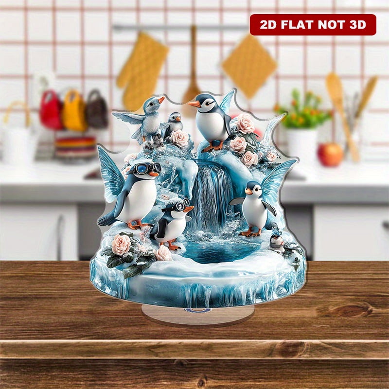 Rotating acrylic display featuring an ultra-realistic penguin and ...