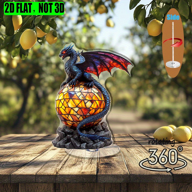 Rotating acrylic display featuring a black dragon with blue scales on a ...