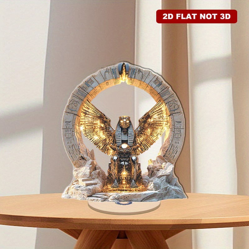 Rotating acrylic display featuring a broken mirror shard sphinx and holographic winged scarab ...