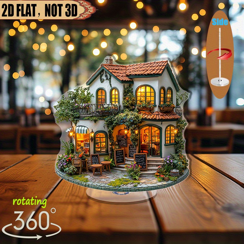 Rotating acrylic display featuring a charming miniature house with a ...
