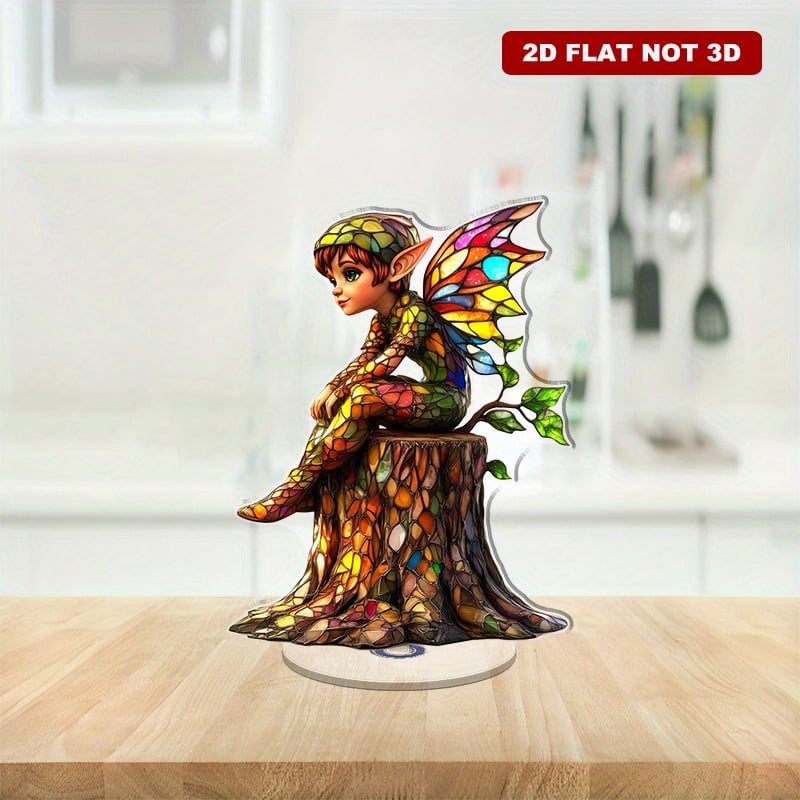 Rotating acrylic display featuring a cute elf atop a vibrant stained ...