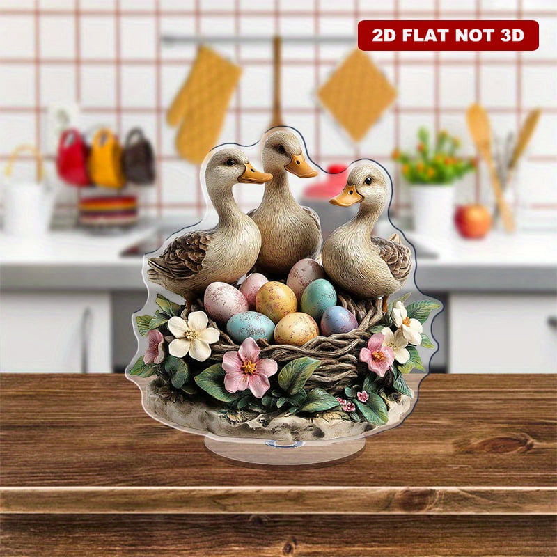 Rotating acrylic display featuring detailed ducks around a nest of ...