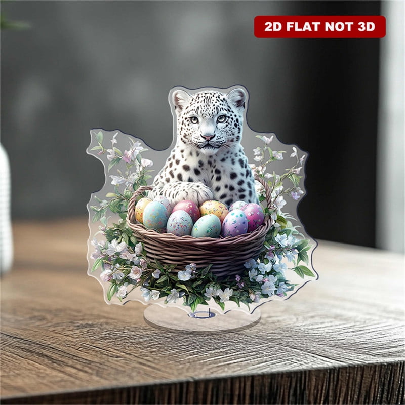 Rotating acrylic display featuring a detailed snow leopard nestled in a ...