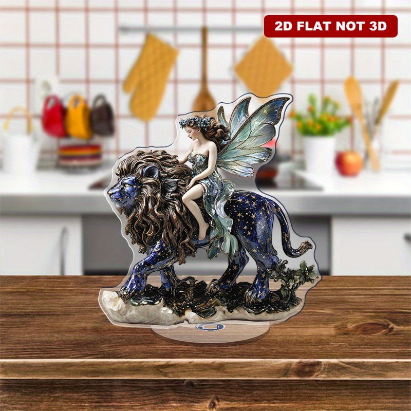 Rotating acrylic display featuring a fairy on a winged lion with ...