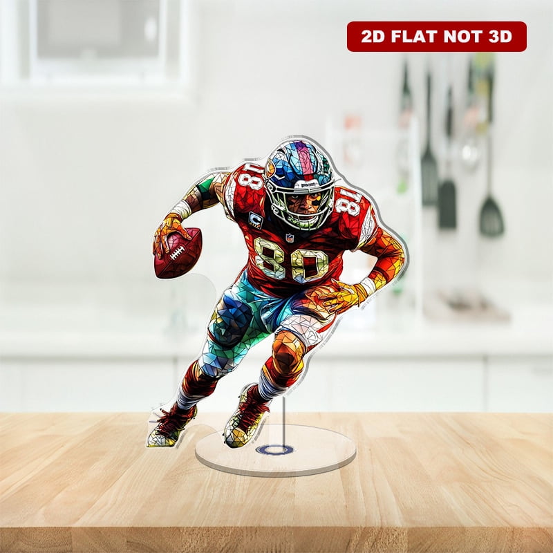 Rotating acrylic display featuring a football player charging down the ...