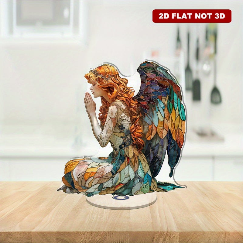 Rotating acrylic display featuring a hyper-realistic angel praying in ...