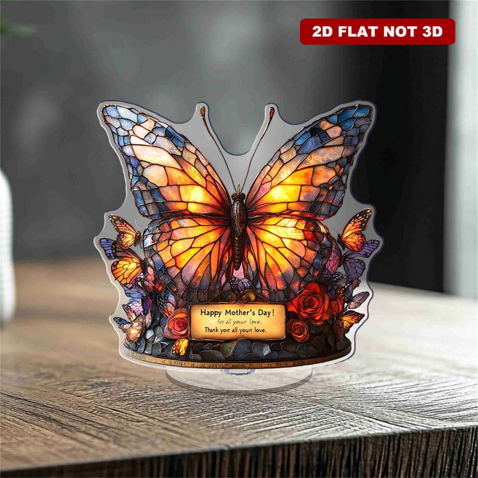 Rotating acrylic display featuring a large stained glass butterfly with ...