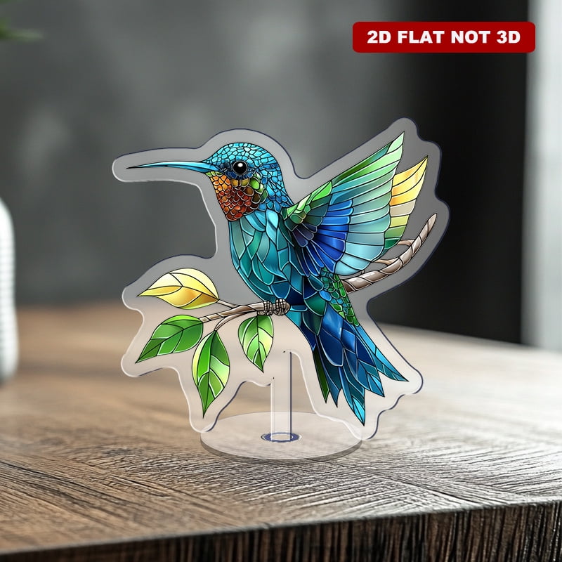 Rotating acrylic display featuring a lifelike turquoise hummingbird on ...