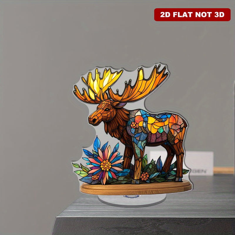 Rotating acrylic display featuring moose, bells, stained glass flowers ...