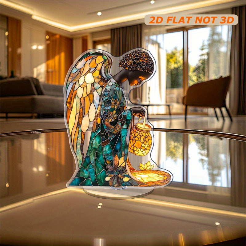 Rotating acrylic display featuring a radiant African angel pouring ...