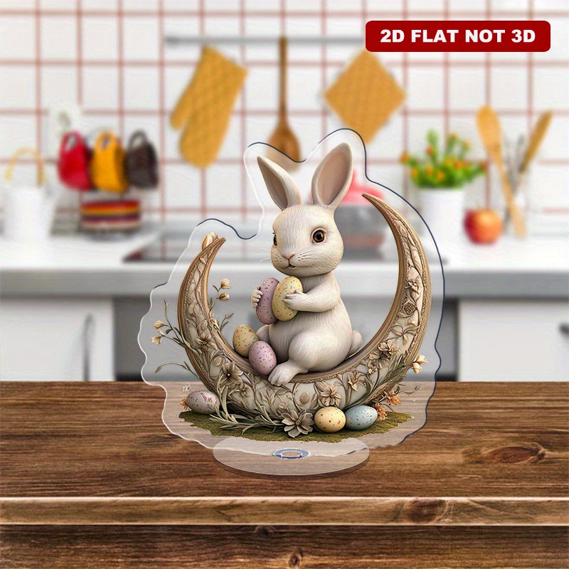 Rotating acrylic display featuring a realistic bunny on an Easter ...