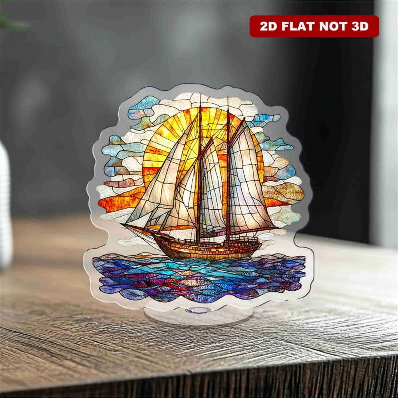 Rotating acrylic display featuring a sailboat in stained glass texture ...