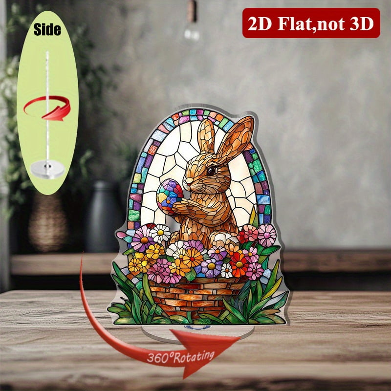 Rotating acrylic display featuring a stained glass rabbit holding an ...