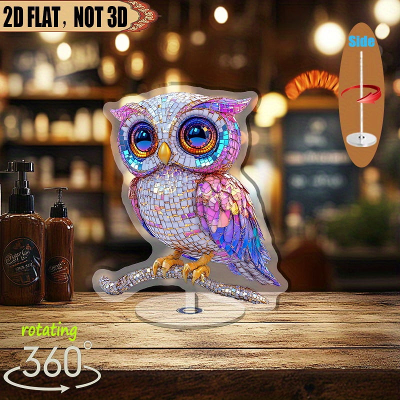 Rotating acrylic display featuring a stunning owl with vibrant feathers ...