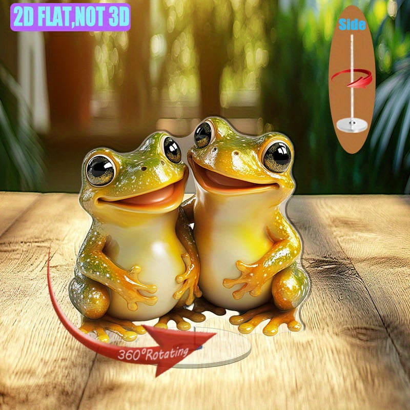 Rotating acrylic display featuring two cartoon frogs in ultra-realistic ...
