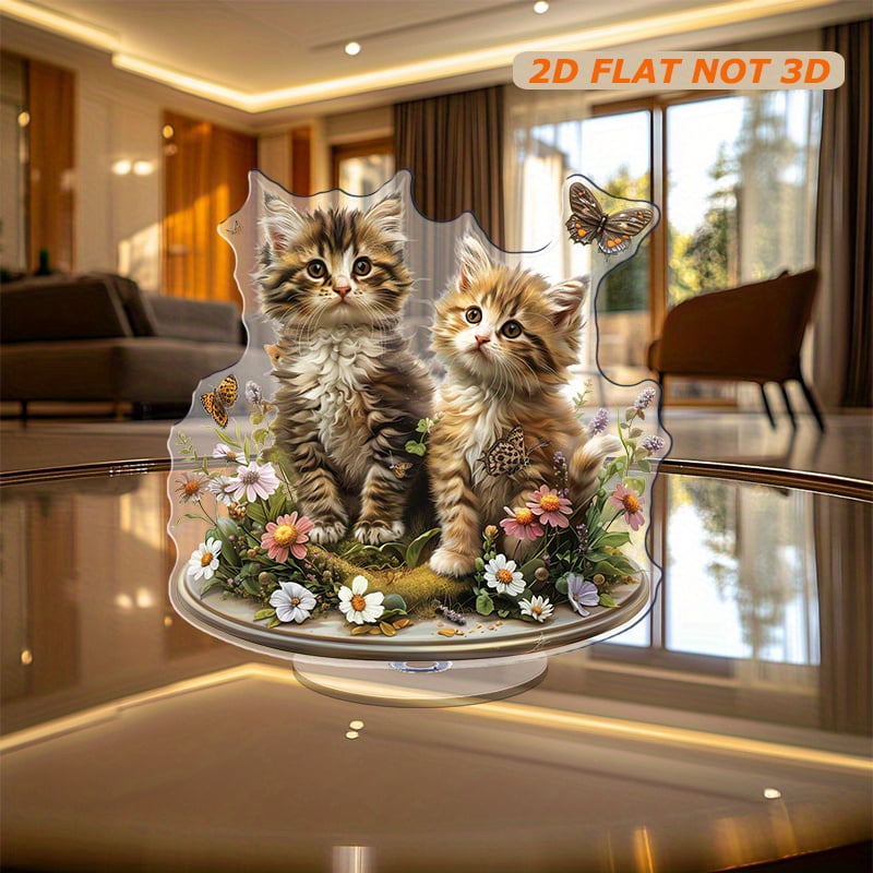 Rotating acrylic display featuring two kittens amidst vibrant flowers ...