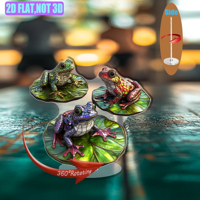 Rotating acrylic display featuring vibrant exotic frogs on lily pads in ...