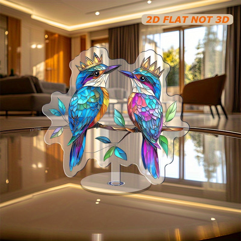 Rotating acrylic display featuring vibrant kingfishers with crowns on a ...