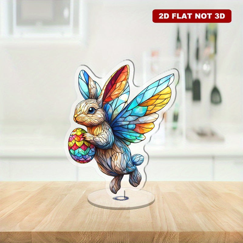 Rotating acrylic display featuring a vibrant stained glass flying ...