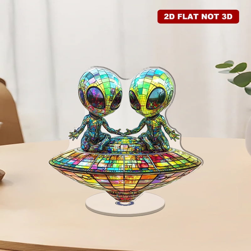 Rotating acrylic display featuring vibrant stained glass style aliens ...