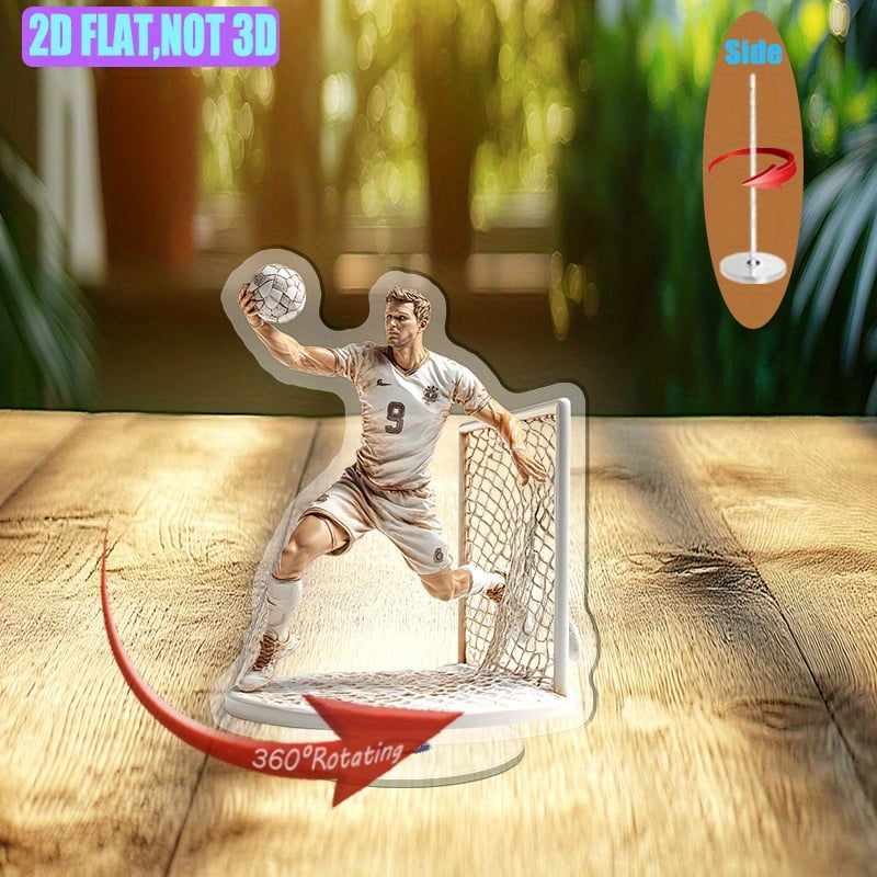 Rotating acrylic display showcases a dynamic handball player evading a ...