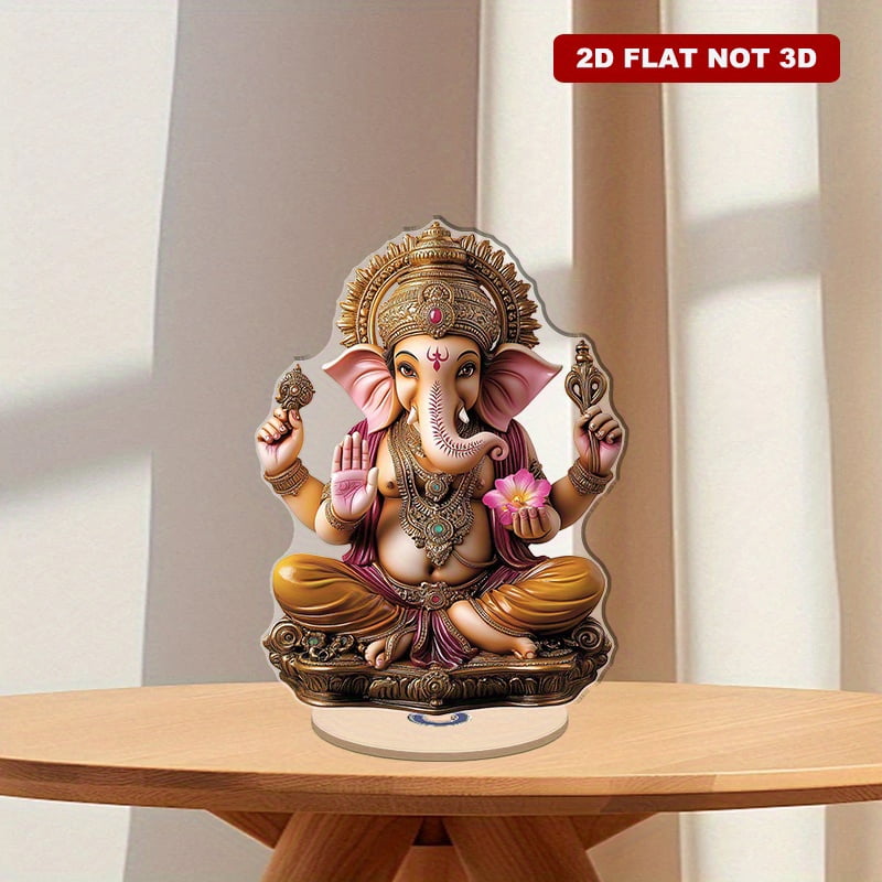 Rotating acrylic figurine of Lord Ganesh adorned with vibrant colors ...