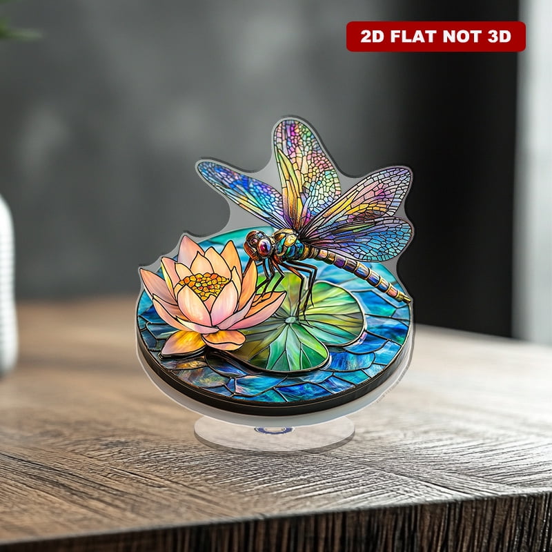 Rotating acrylic figurine of a colorful dragonfly with iridescent wings ...