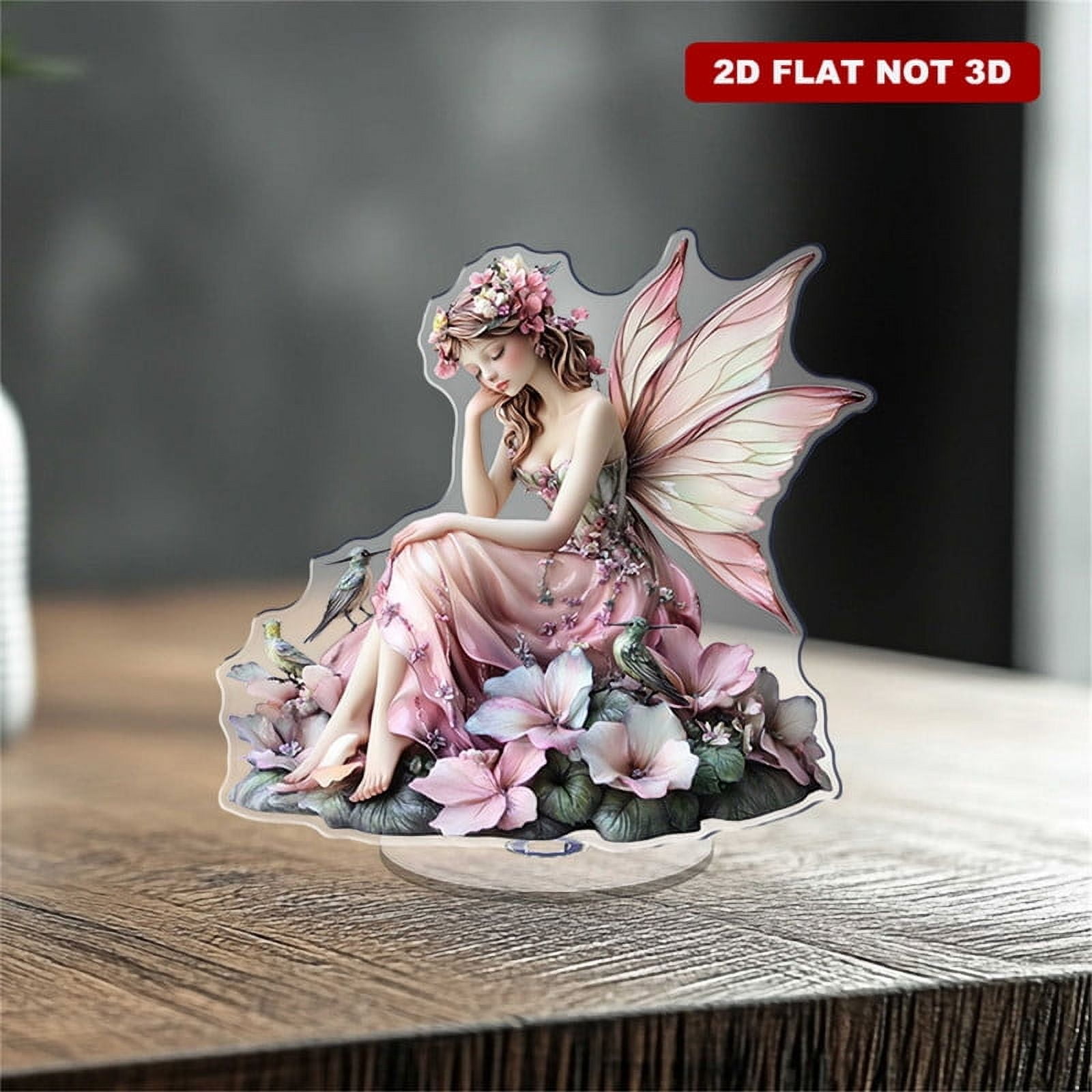 Rotating acrylic figurine of a fairy in a pink dress with pastel ...
