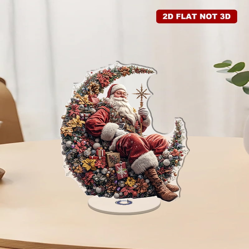 Rotating acrylic ornament features Santa Claus on a crescent moon ...