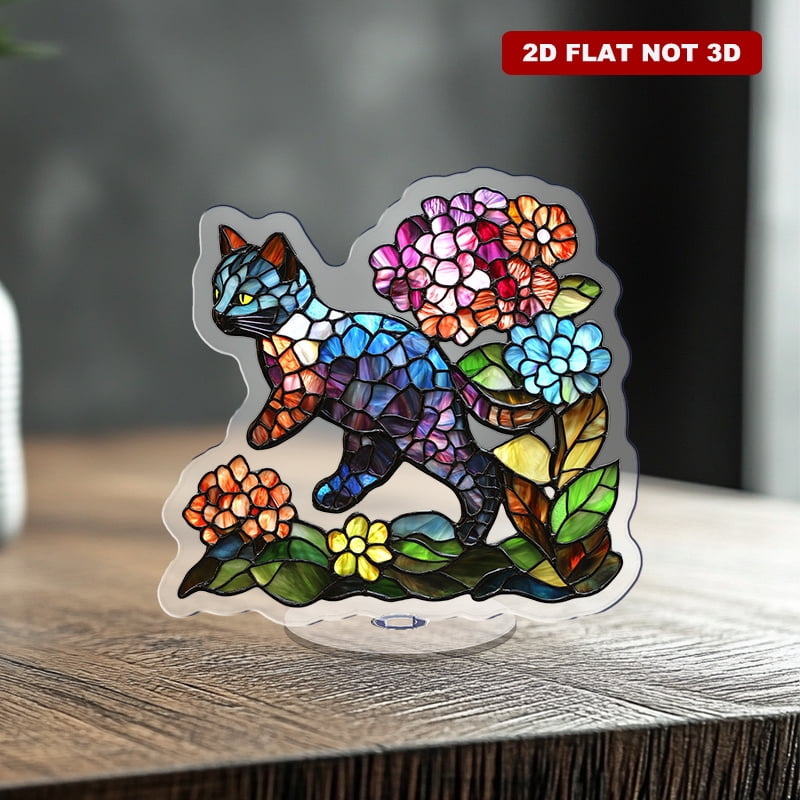 Rotating acrylic ornament features a colorful stained glass cat chasing ...