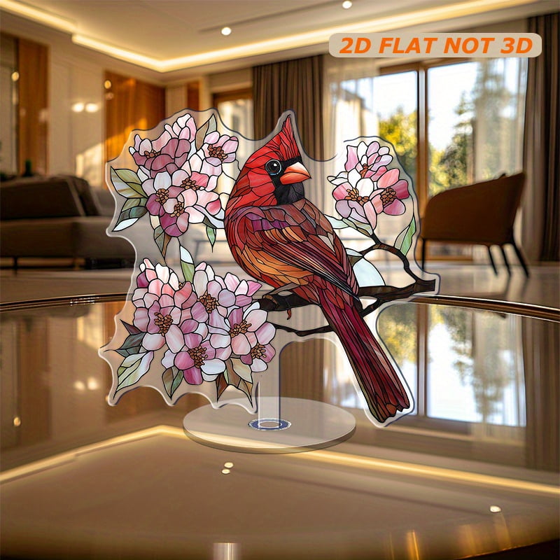 Rotating acrylic ornament features a vibrant cardinal on a branch of ...