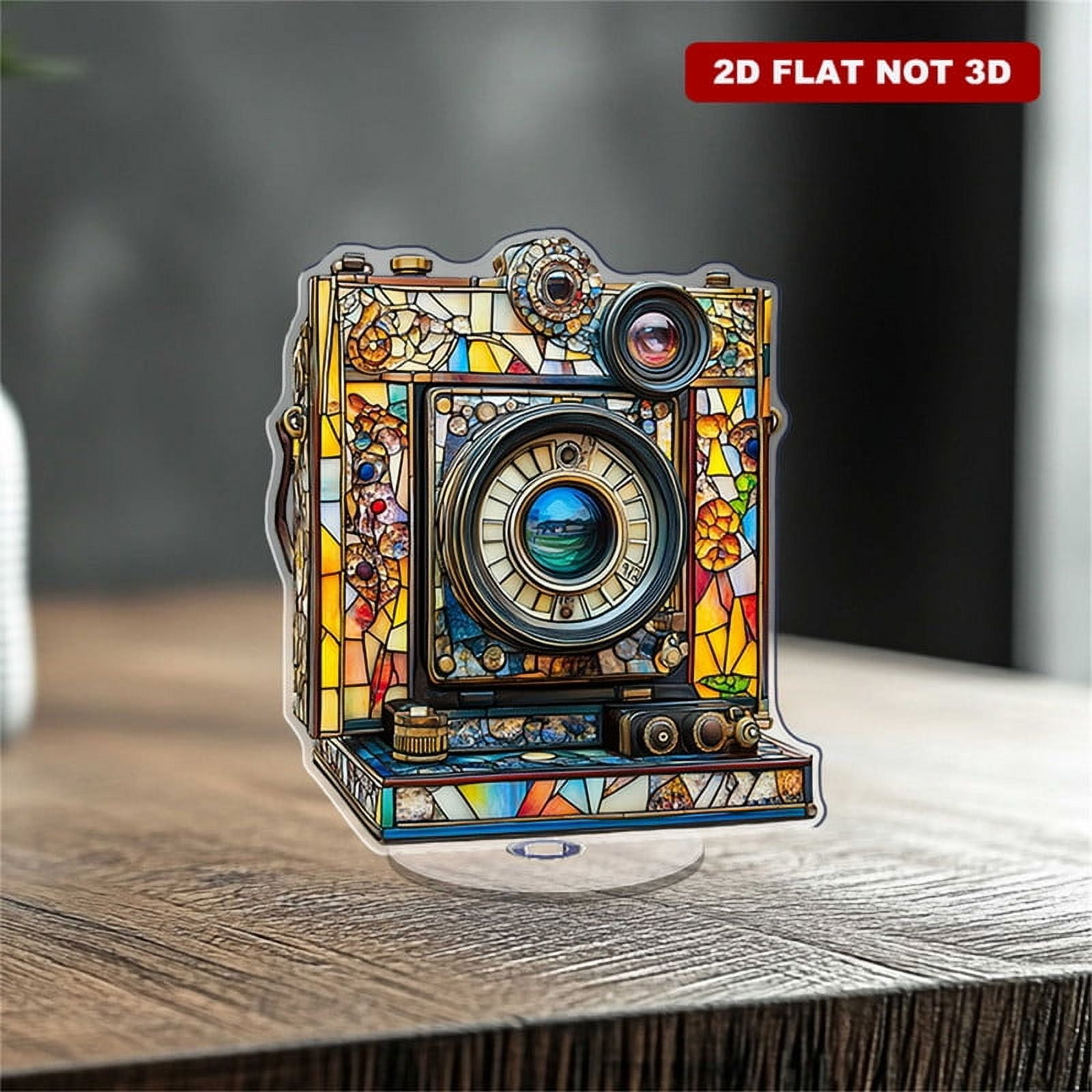 Rotating acrylic ornament features a vibrant stained glass mosaic of an ...