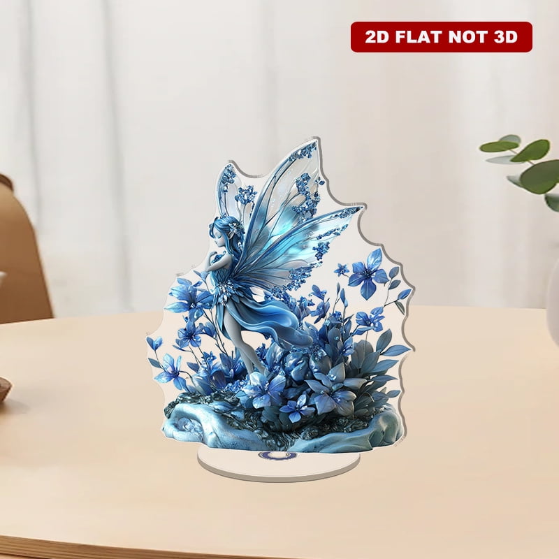 Rotating acrylic ornament features a blue fairy with sparkling wings ...