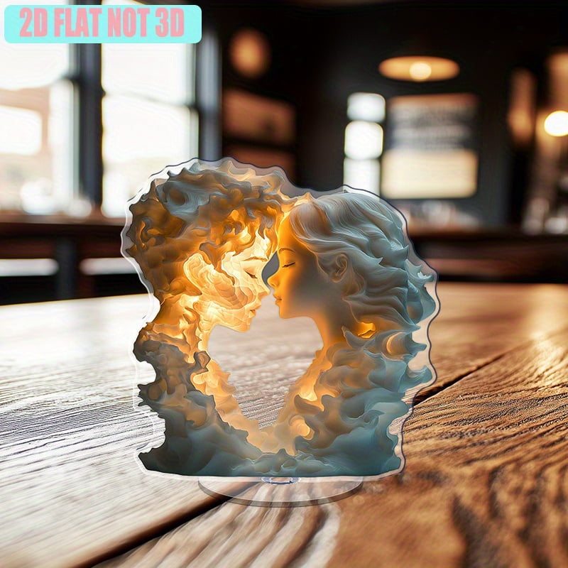 Rotating acrylic ornament features a boy and girl profile with delicate ...