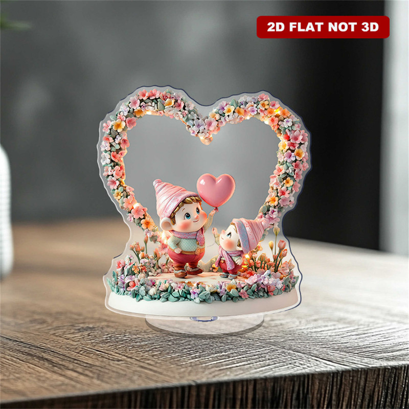 Rotating acrylic ornament features exquisite floral heart border and ...