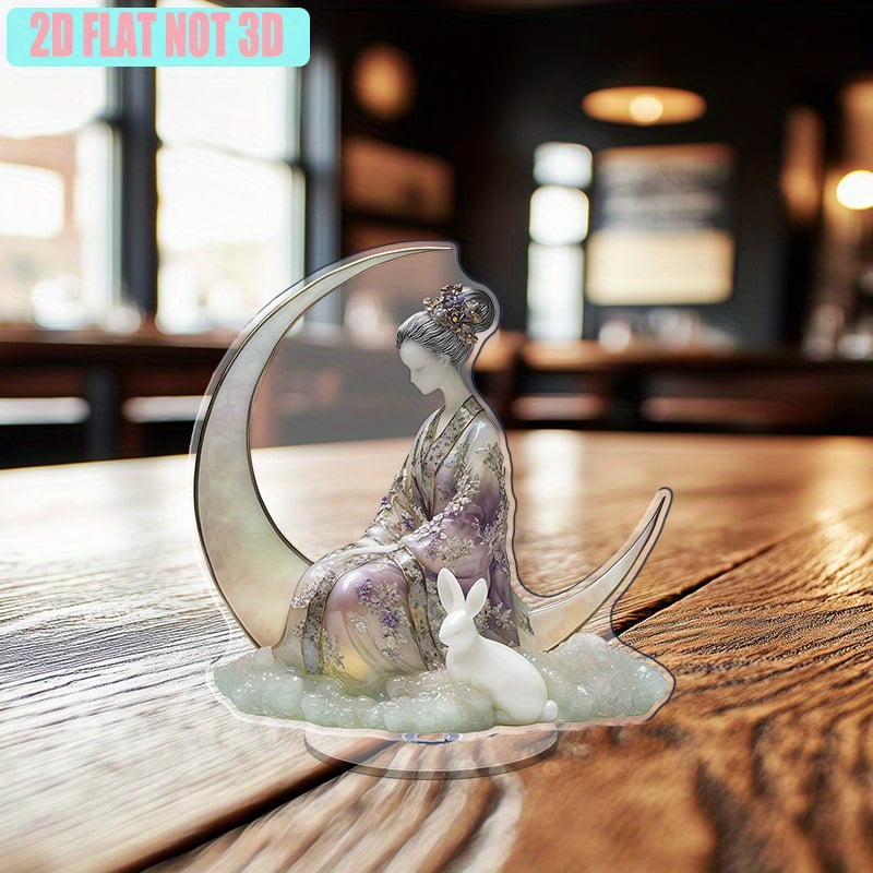 Rotating acrylic ornament features leaded glass panels showcasing an ...