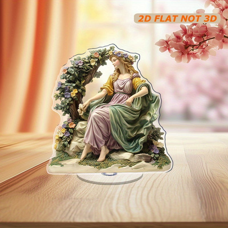Rotating acrylic ornament featuring The Graces in flowing robes amid ...