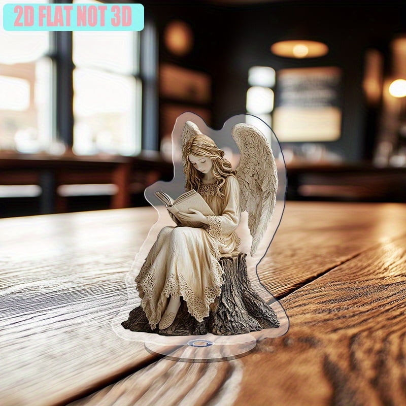 Rotating acrylic ornament featuring a beautifully detailed angel on a ...