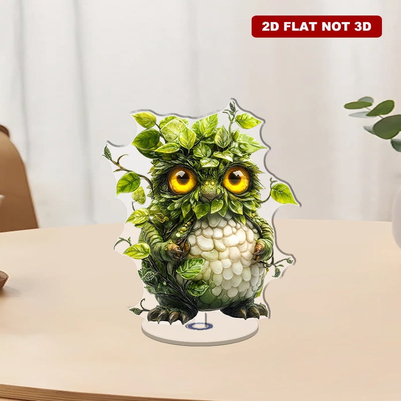 Rotating acrylic ornament featuring a chubby glass plant creature with ...