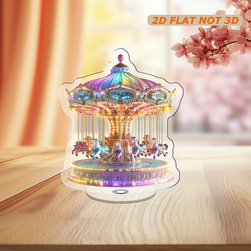 Rotating acrylic ornament featuring a colorful glass carousel adorned ...