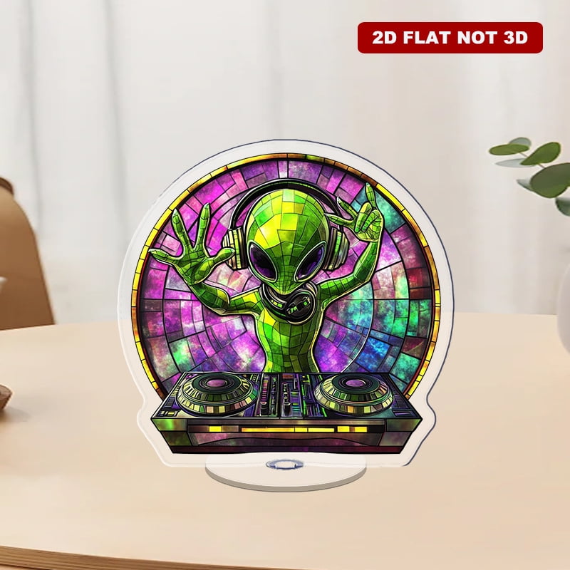 Rotating acrylic ornament featuring a cute green alien DJ with ...