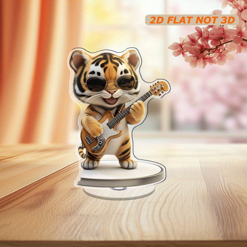 Rotating acrylic ornament featuring a cute tiger playing a rock ...