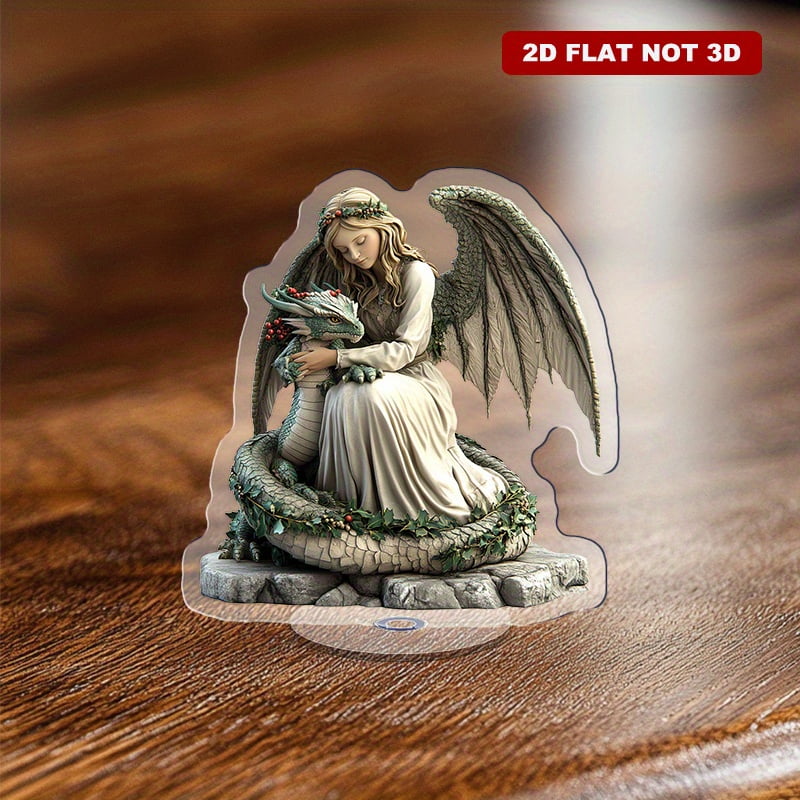 Rotating acrylic ornament featuring a detailed Christmas angel with a ...