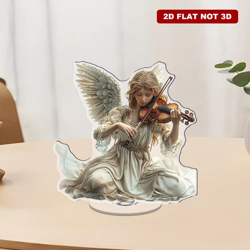 Rotating acrylic ornament featuring a detailed angel with wings playing ...